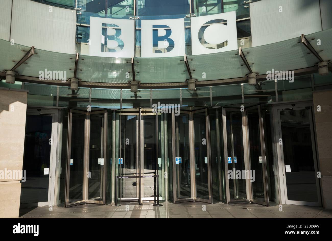 BBC logo letters on glass screen above the entrance door / doors of the ...