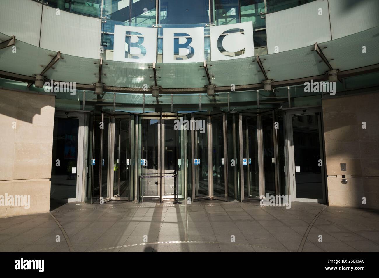 BBC logo letters on glass screen above the entrance door / doors of the ...