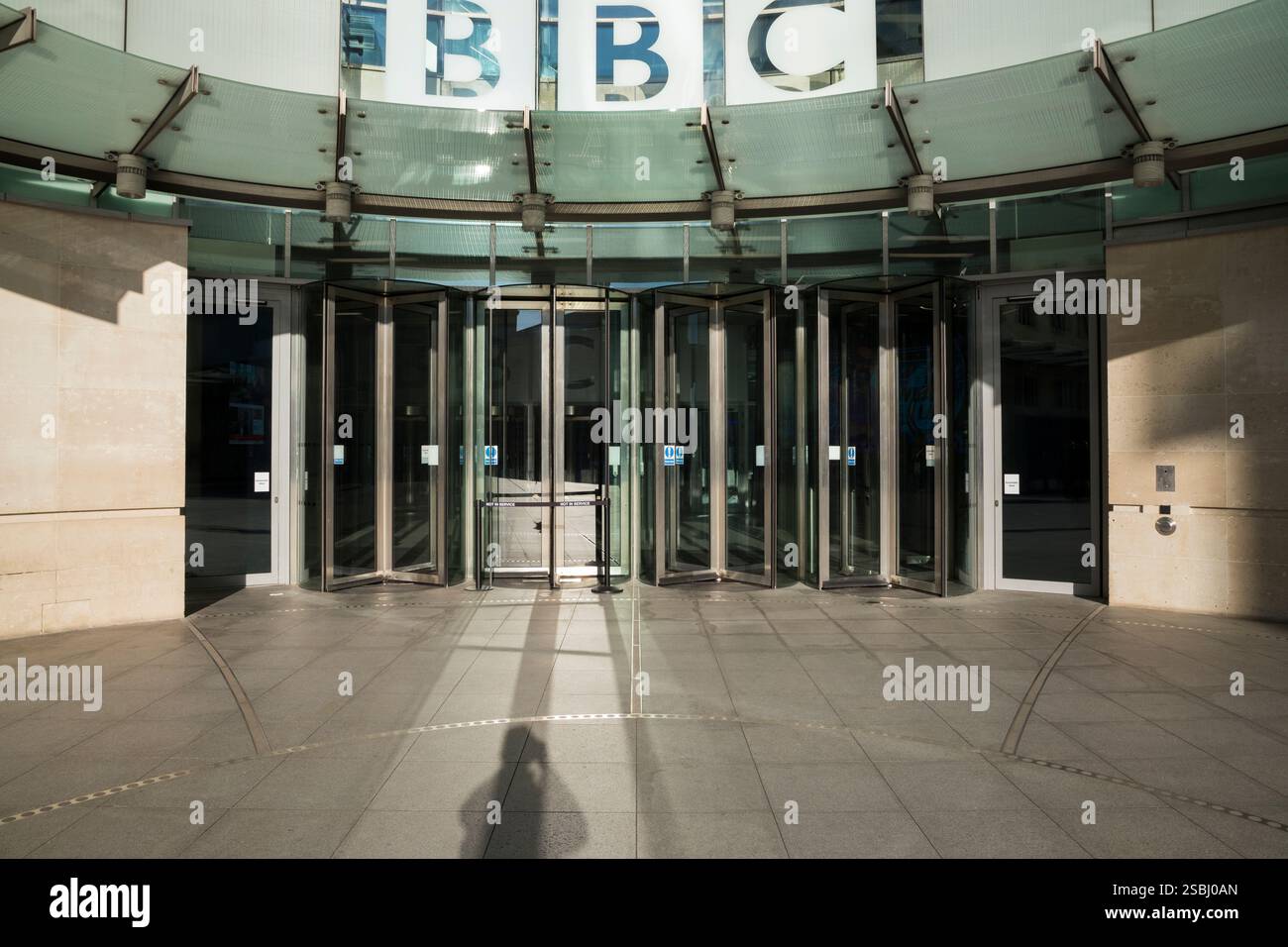 BBC logo letters on glass screen above the entrance door / doors of the ...