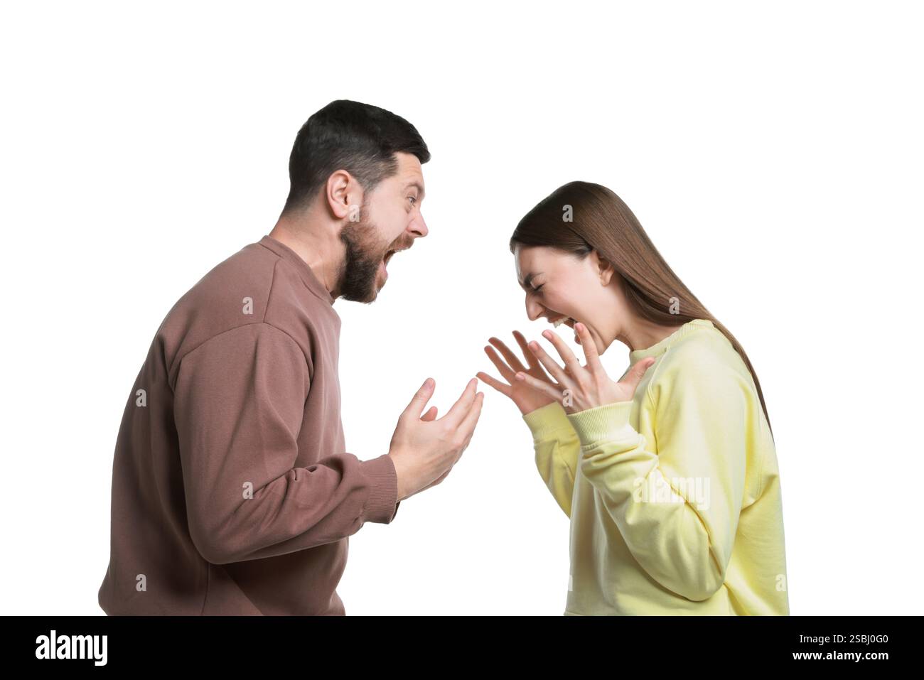 Angry couple arguing and screaming on white background Stock Photo - Alamy