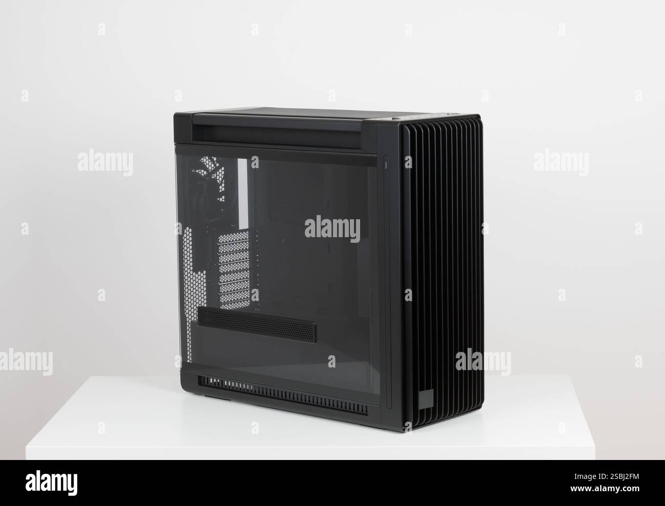 Side view of empty big tower, PC case, chassis, tempered-glass left ...
