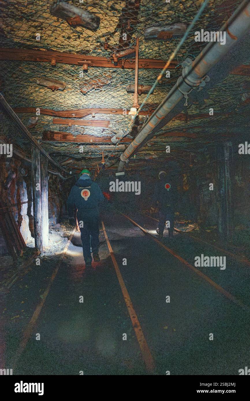 Walking along minecart rails in coal mines in Longyearbyen, Svalbard ...