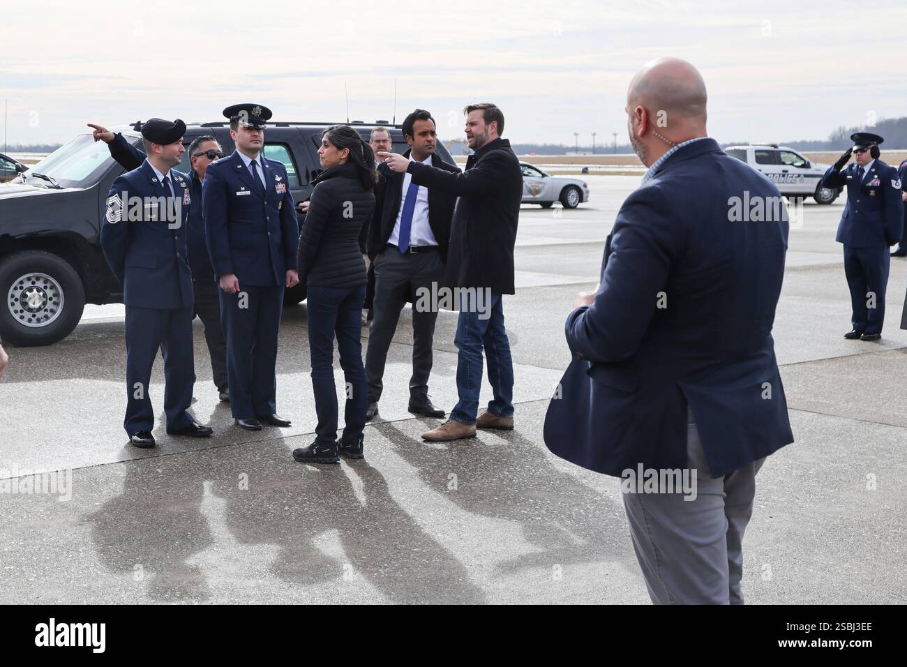Vice President JD Vance, center, speaks with Vivek Ramaswamy as Vance ...