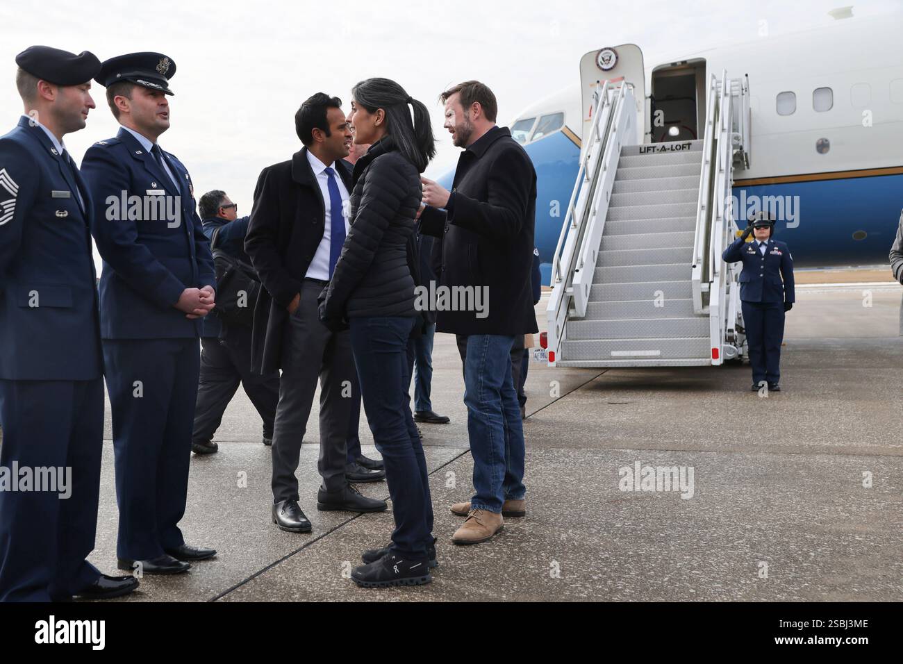 Vice President JD Vance, center, speaks with Vivek Ramaswamy as Vance ...
