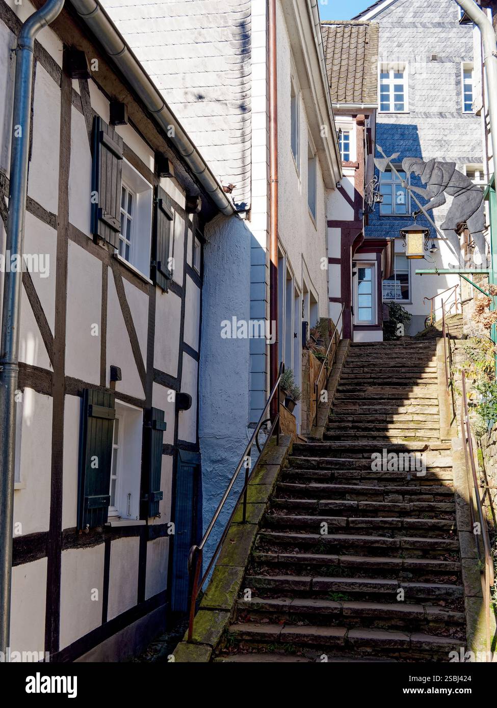 The adjacent houses are among the oldest medieval buildings in the town ...