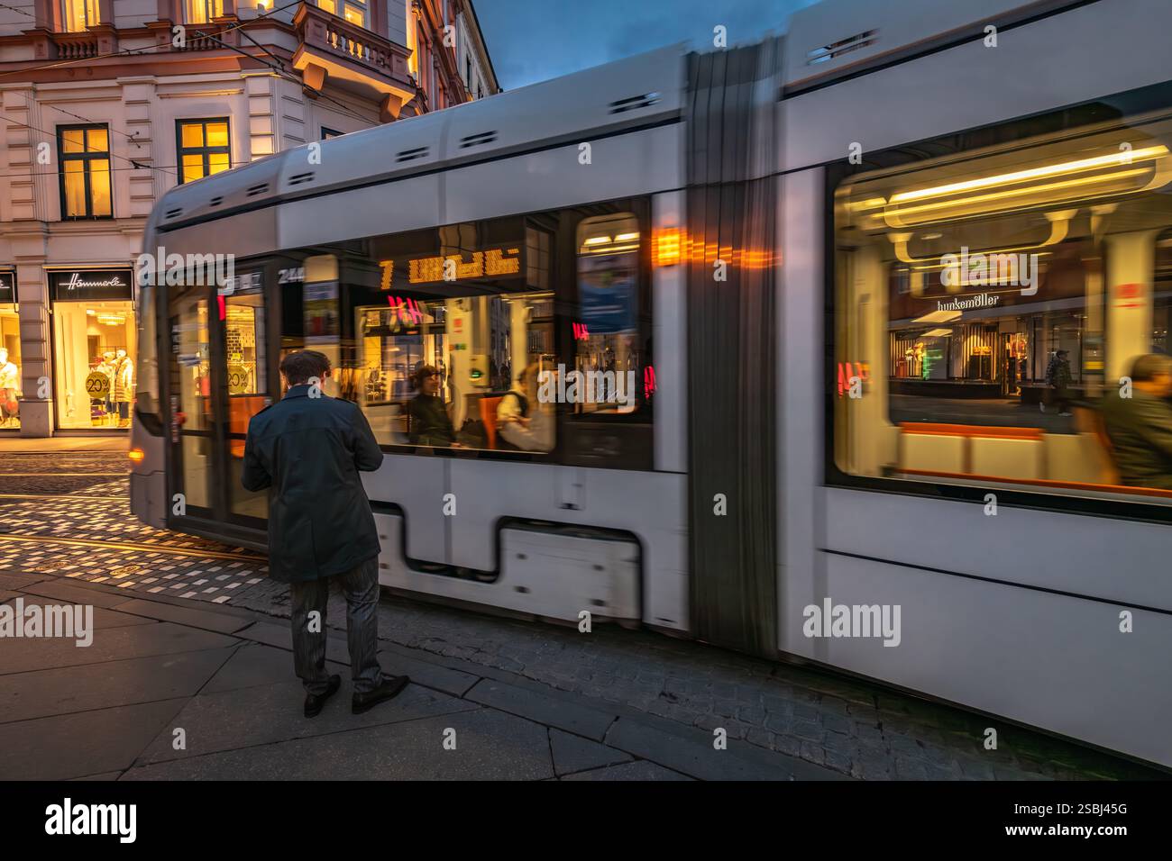 Evening color cloudy streets in cold winter city of Graz Austria 02 01 ...