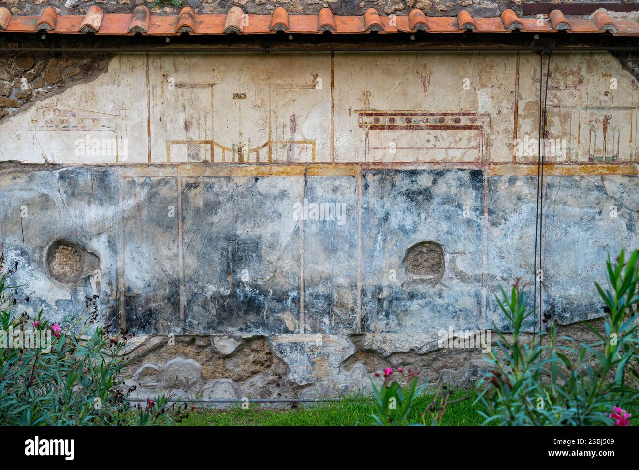 Ancient frescoes on the stucco wall below the Antiquarium or museum in ...