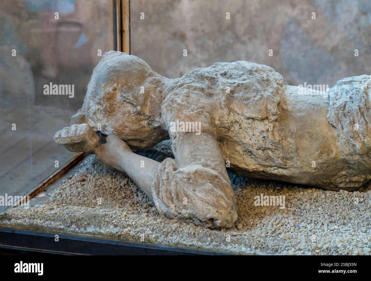 Plaster cast of a victim of the volcanic eruption, displayed in the ...