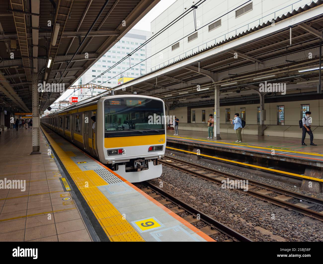 Chuo-Sobu Line train at Akihabara JR Station at the center of Akihabara ...