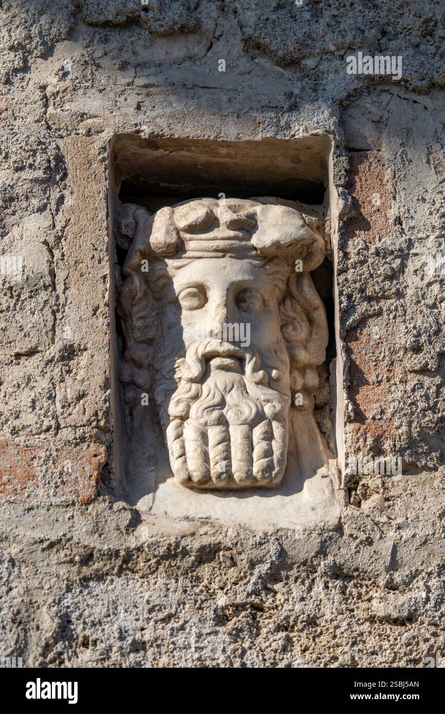 Bust of Dionysus in a niche on the Taberna delle Quattro Divinita ...