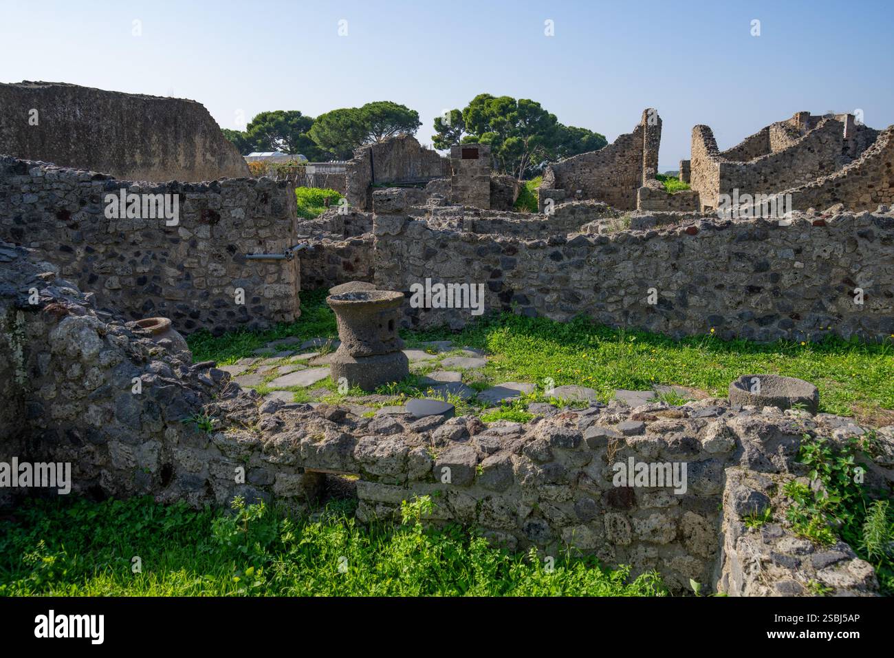A Roman mill made of lava rock in Building VII.16.6, a workshop in the ...