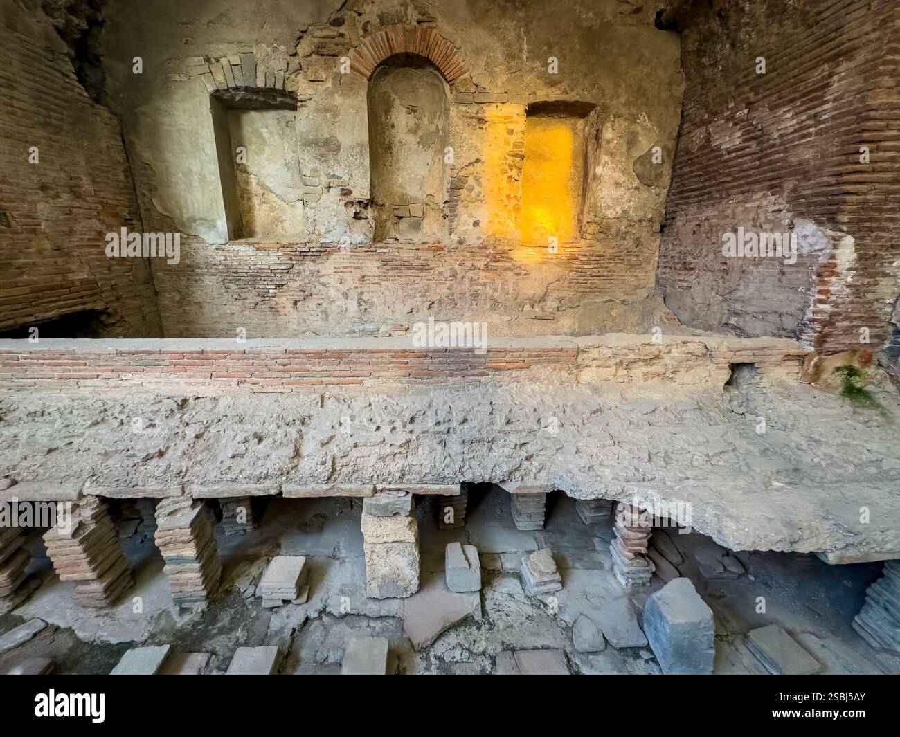 The hypocaust floor supports in the calidarium in the Stabian Baths in ...