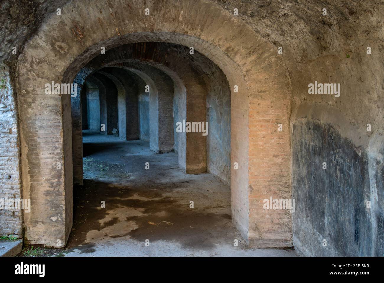 A circular corridor under the Amphitheater of Pompeii in the ancient ...