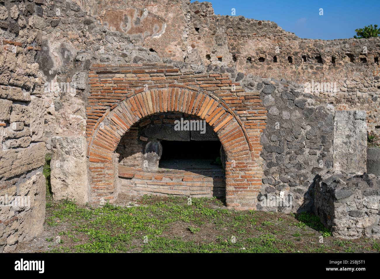 Ruins of a pastry bakery, Building I.14.3, in the ancient Roman ruins ...