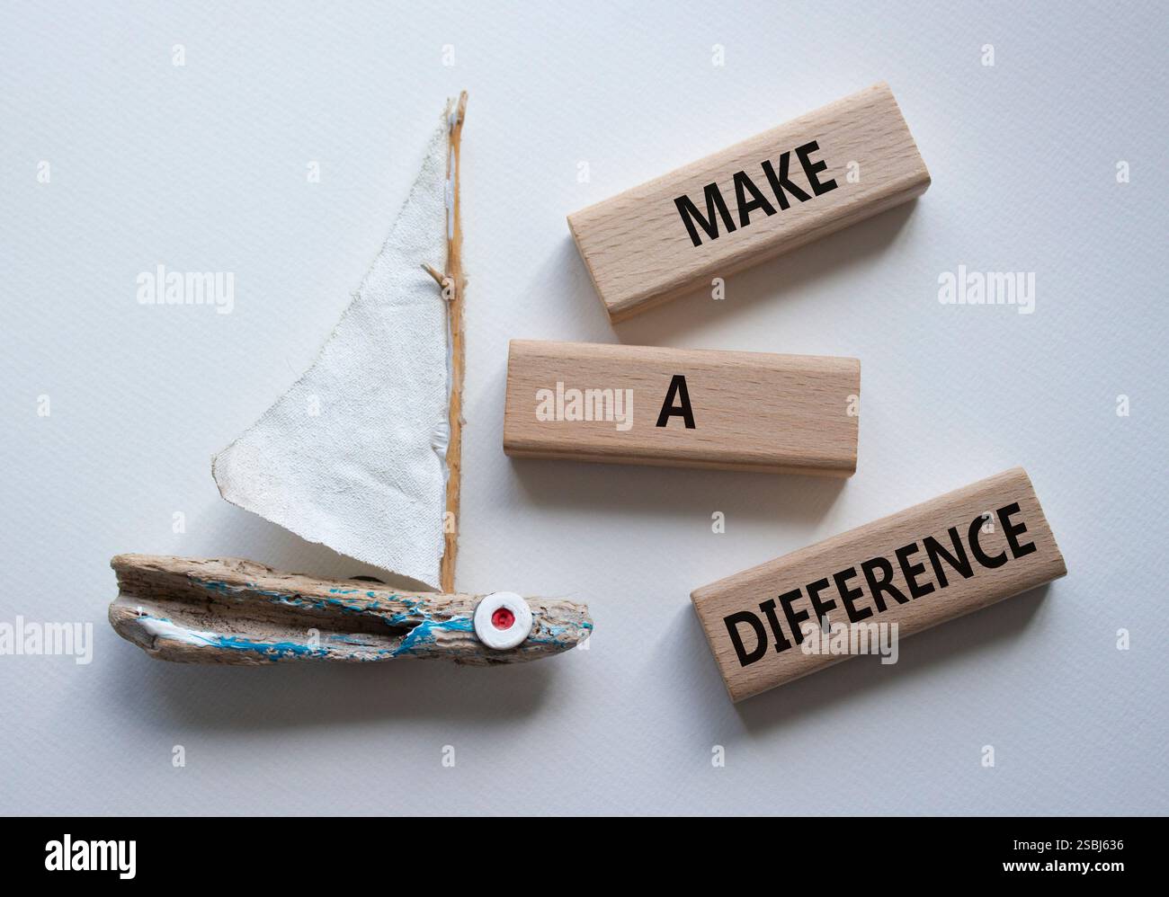 Make a difference symbol. Concept words Make a difference on wooden ...