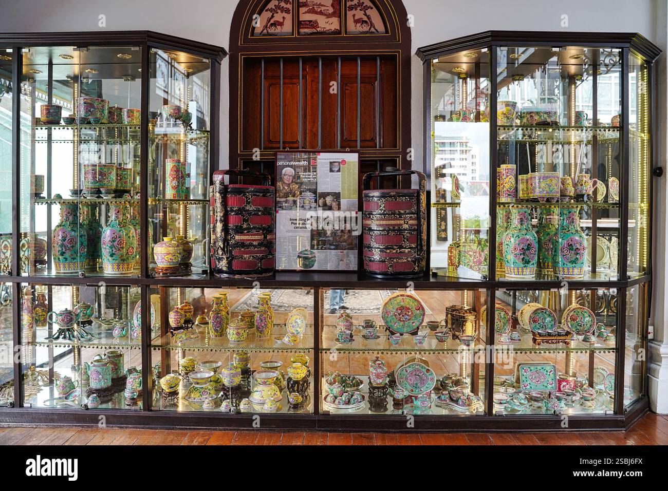 Display cabinets with fine porcelain ware and european dinner ware at ...