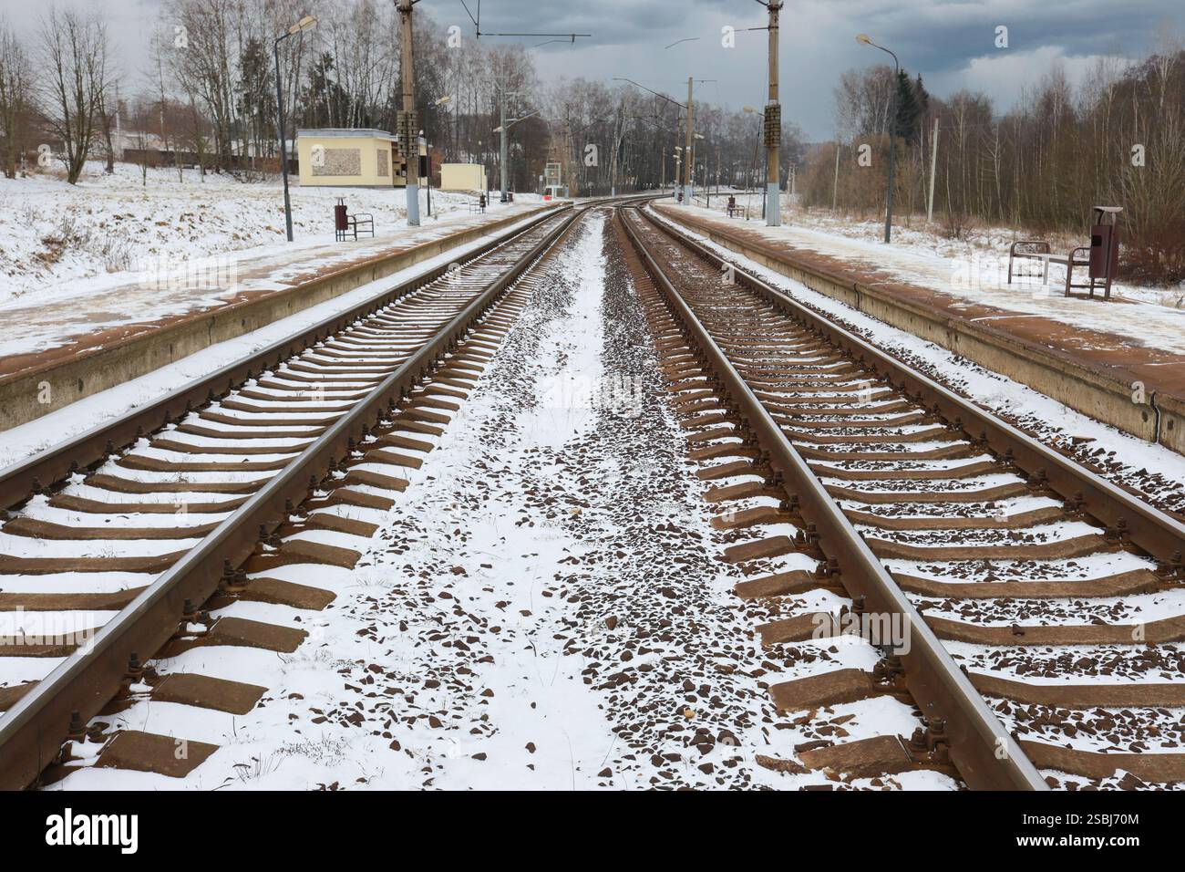 Two railroad tracks, rails leading off into the distance to the ...