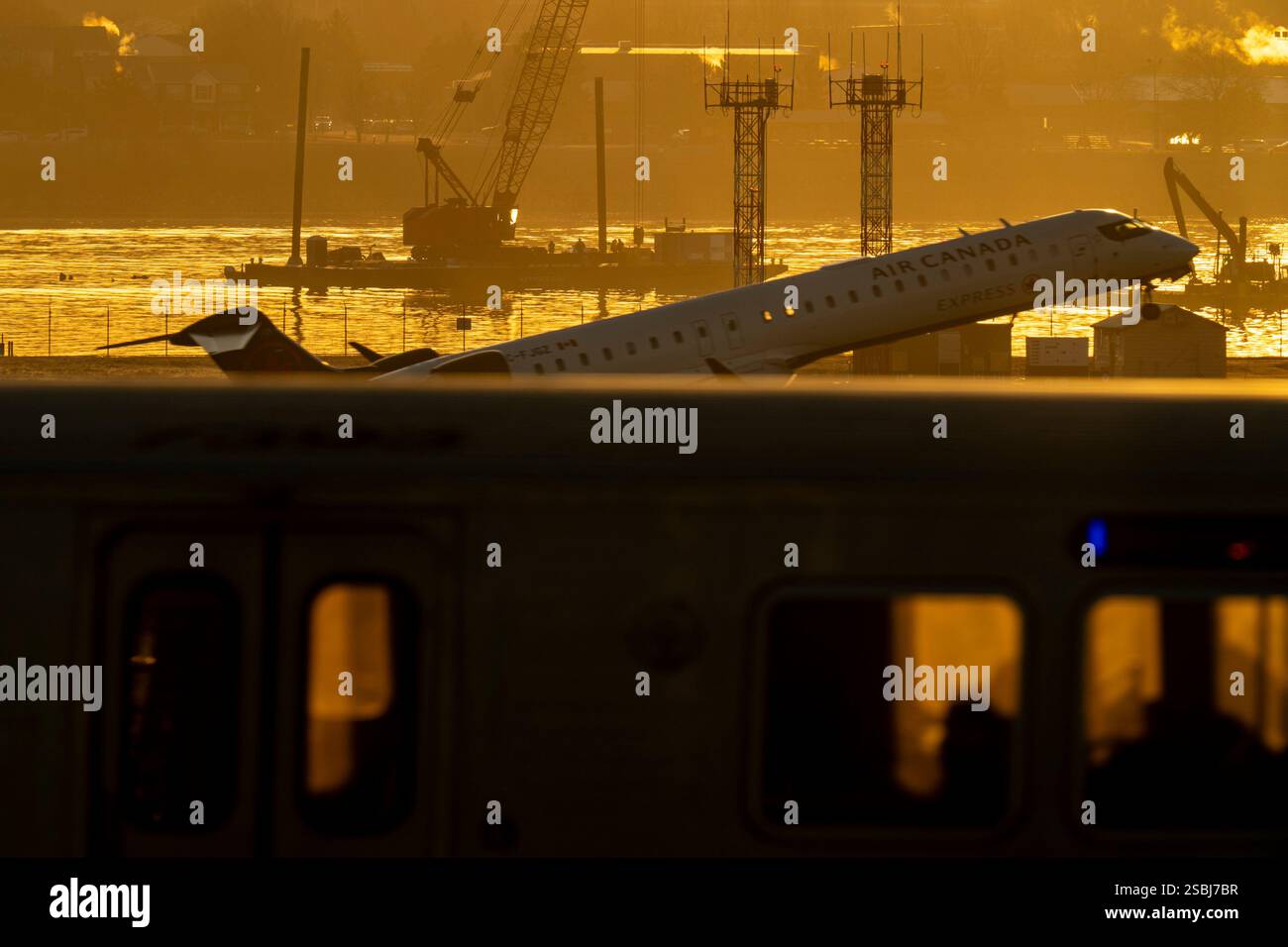 A plane takes off as recovery salvage experts are prepared to lift ...