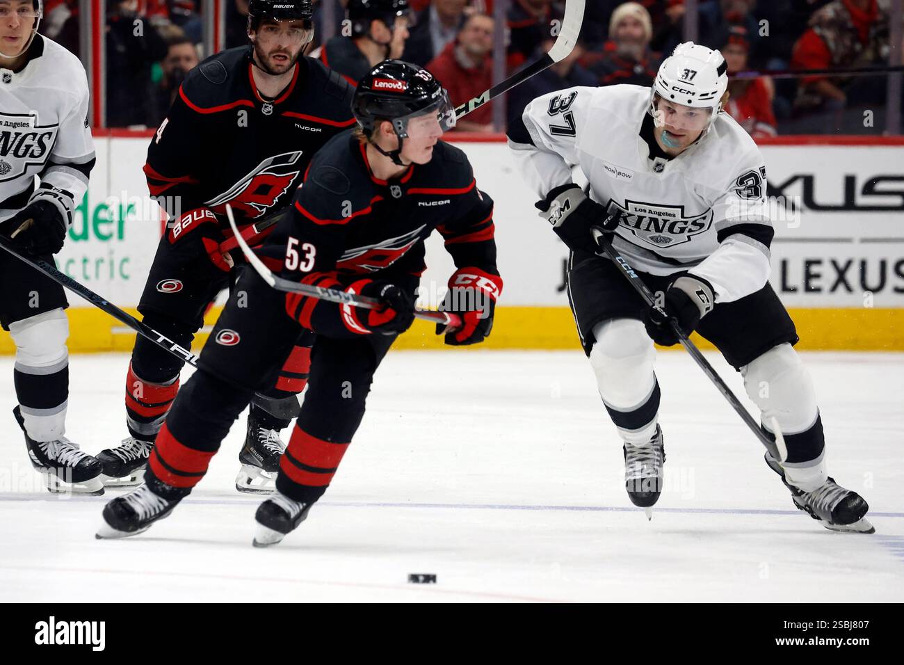 Carolina Hurricanes' Jackson Blake (53) controls the puck in front of ...