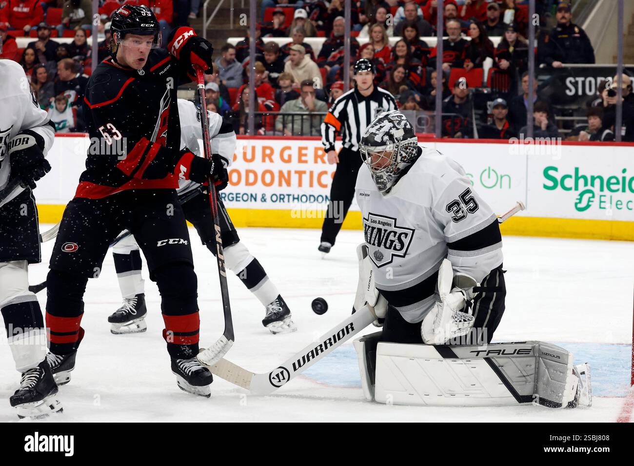 Carolina Hurricanes' Jackson Blake (53) tries to deflect the puck past ...