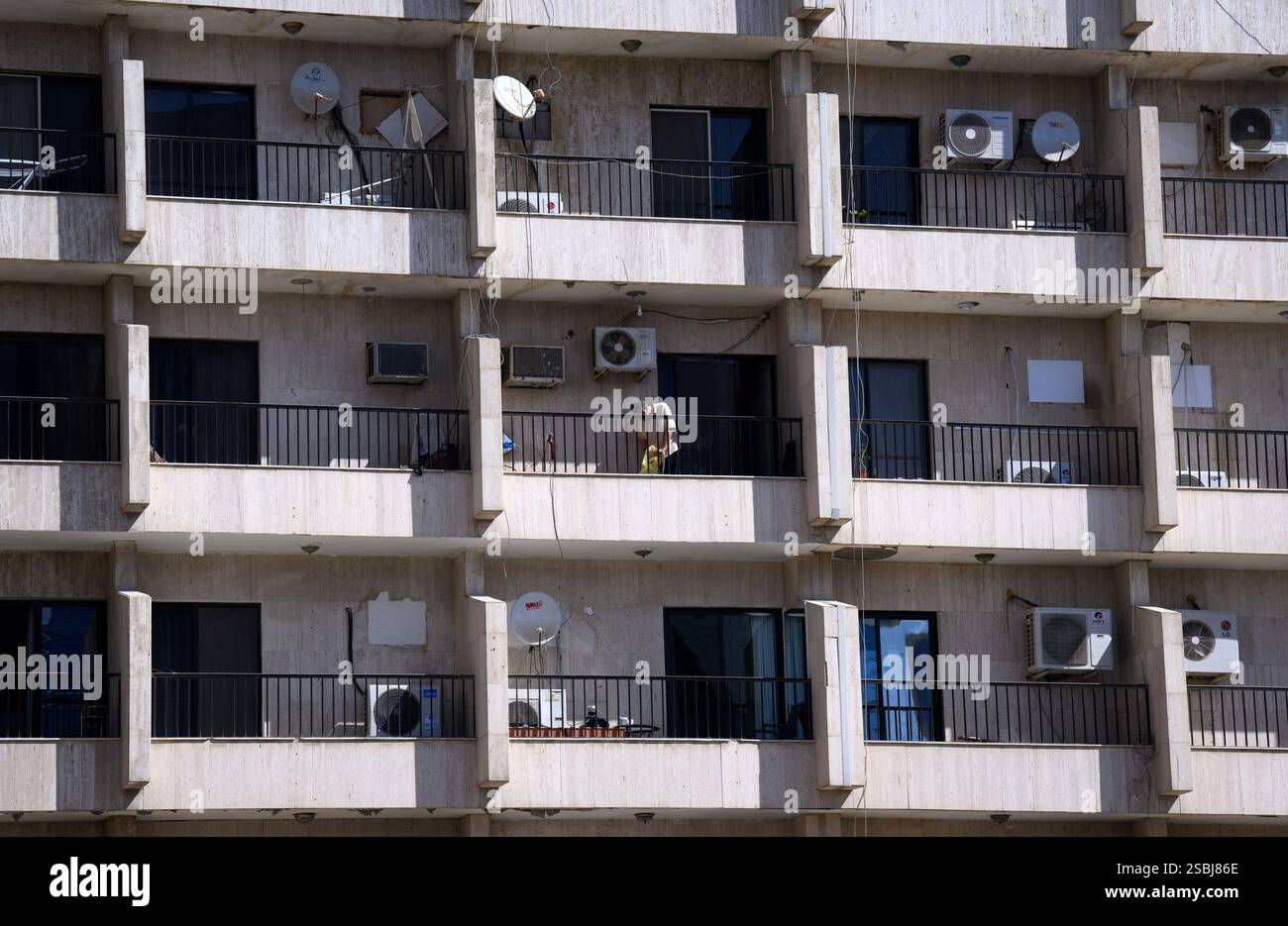 Riad, Saudi Arabia. 03rd Feb, 2025. A man stands on a balcony of a ...