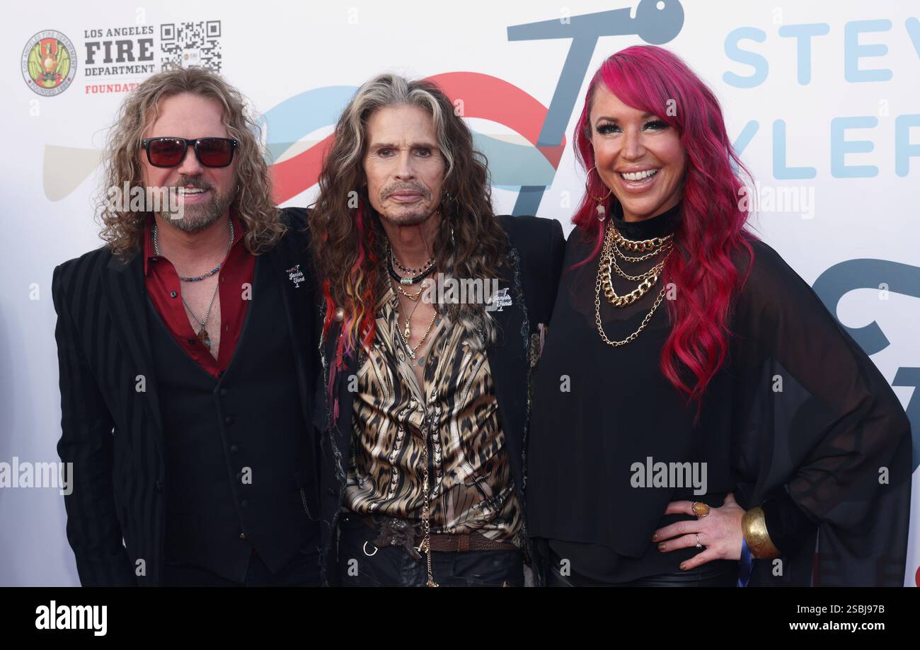 Los Angeles, USA. 03rd Feb, 2025. Buck Johnson, Steven Tyler, and Suzie ...