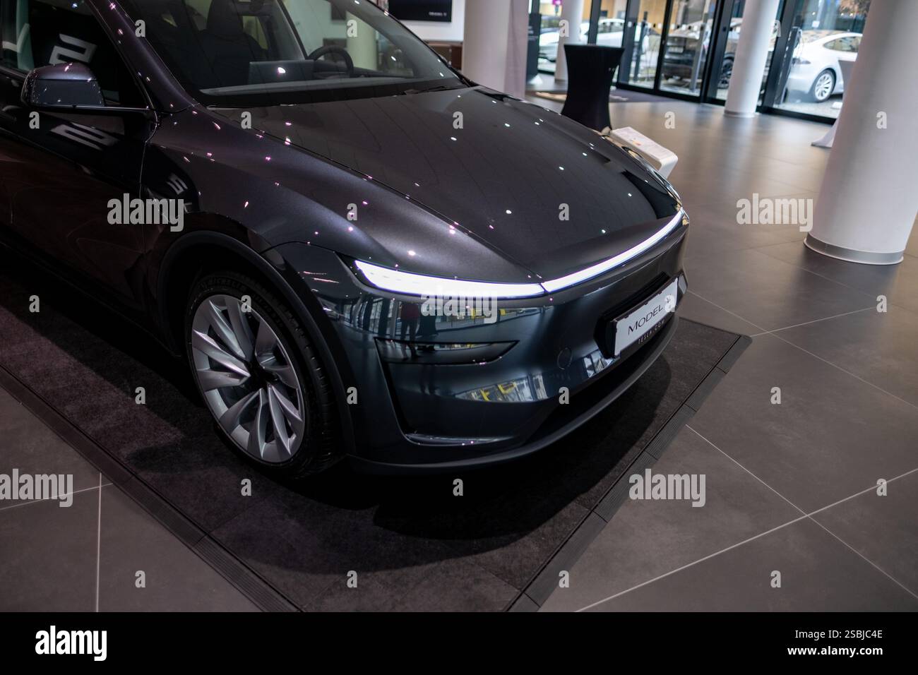 new Tesla car Model Y Juniper 2025 in Studio, black Metallic electric ...