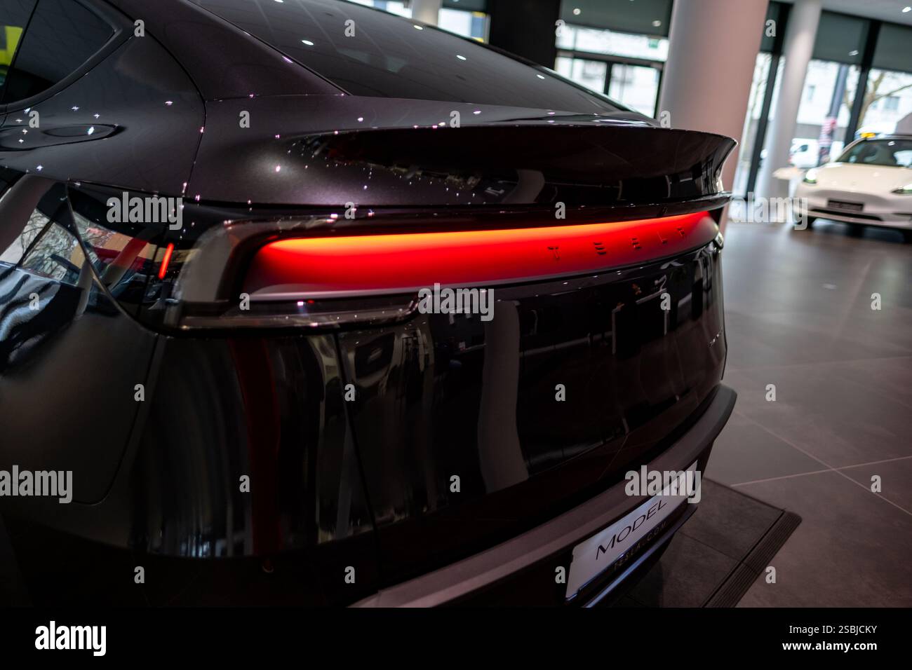 new Tesla car Model Y Juniper 2025 in Studio, black Metallic electric ...