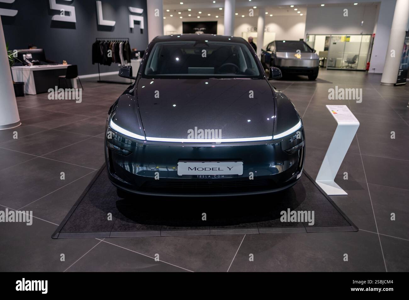 new Tesla car Model Y Juniper 2025 in Studio, black Metallic electric ...