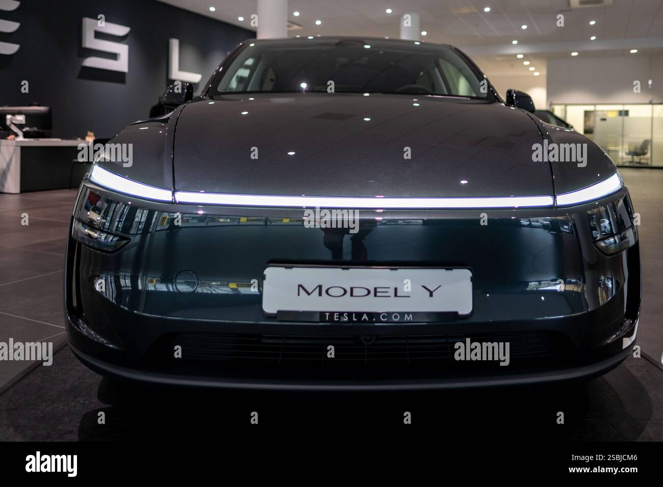 new Tesla car Model Y Juniper 2025 in Studio, black Metallic electric ...