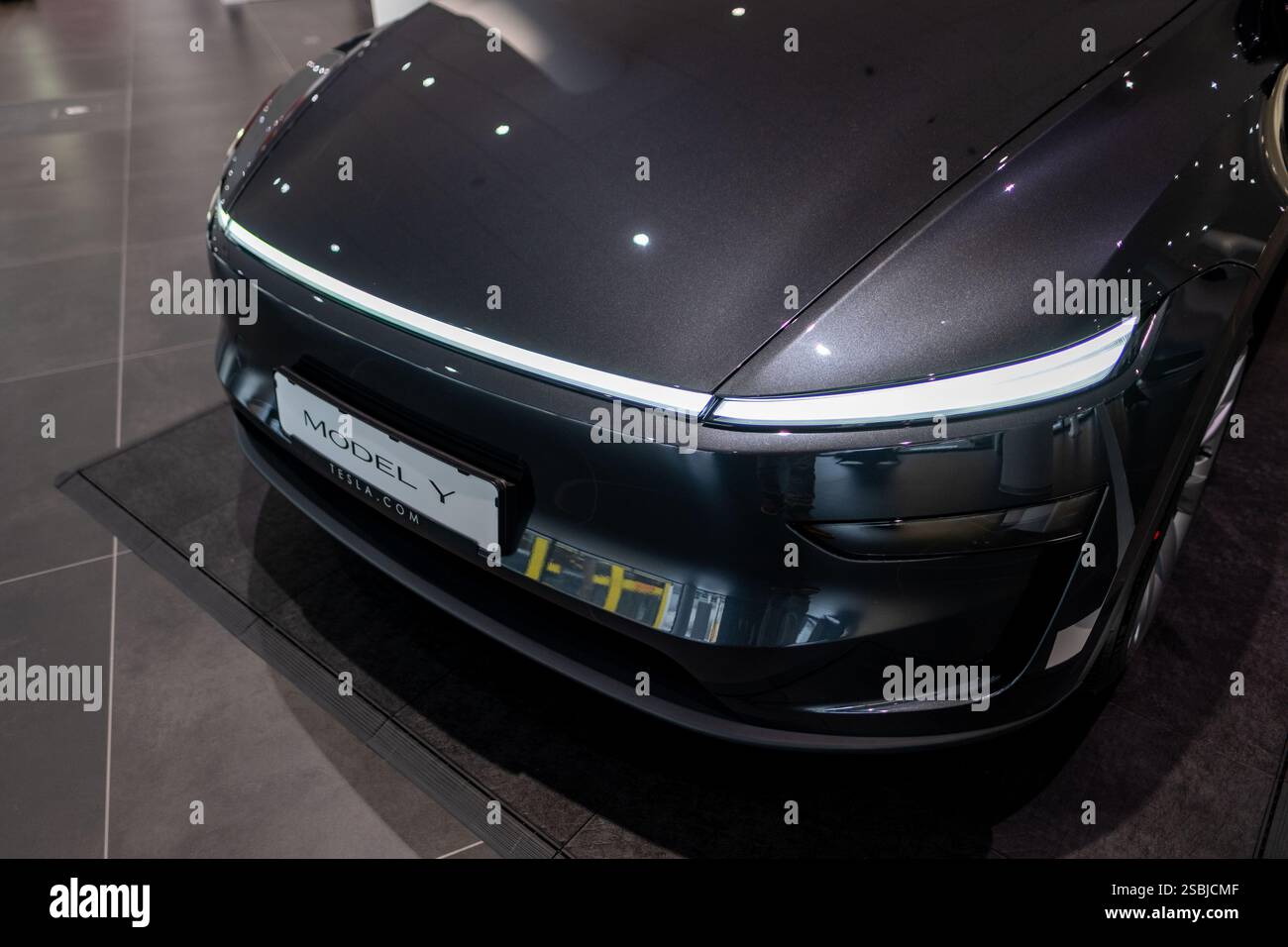 new Tesla car Model Y Juniper 2025 in Studio, black Metallic electric ...