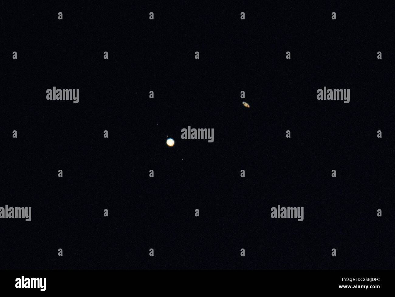 Jupiter, left, and Saturn, right, are seen during the 'great ...
