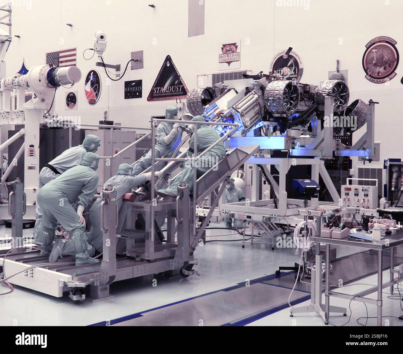 Technicians perform a fit check of the Mars 2020 Perseverance rover and ...