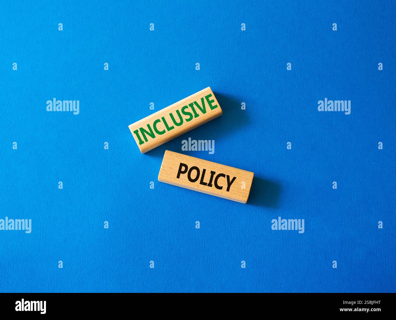 Inclusive policy symbol. Concept word Inclusive policy on wooden blocks ...