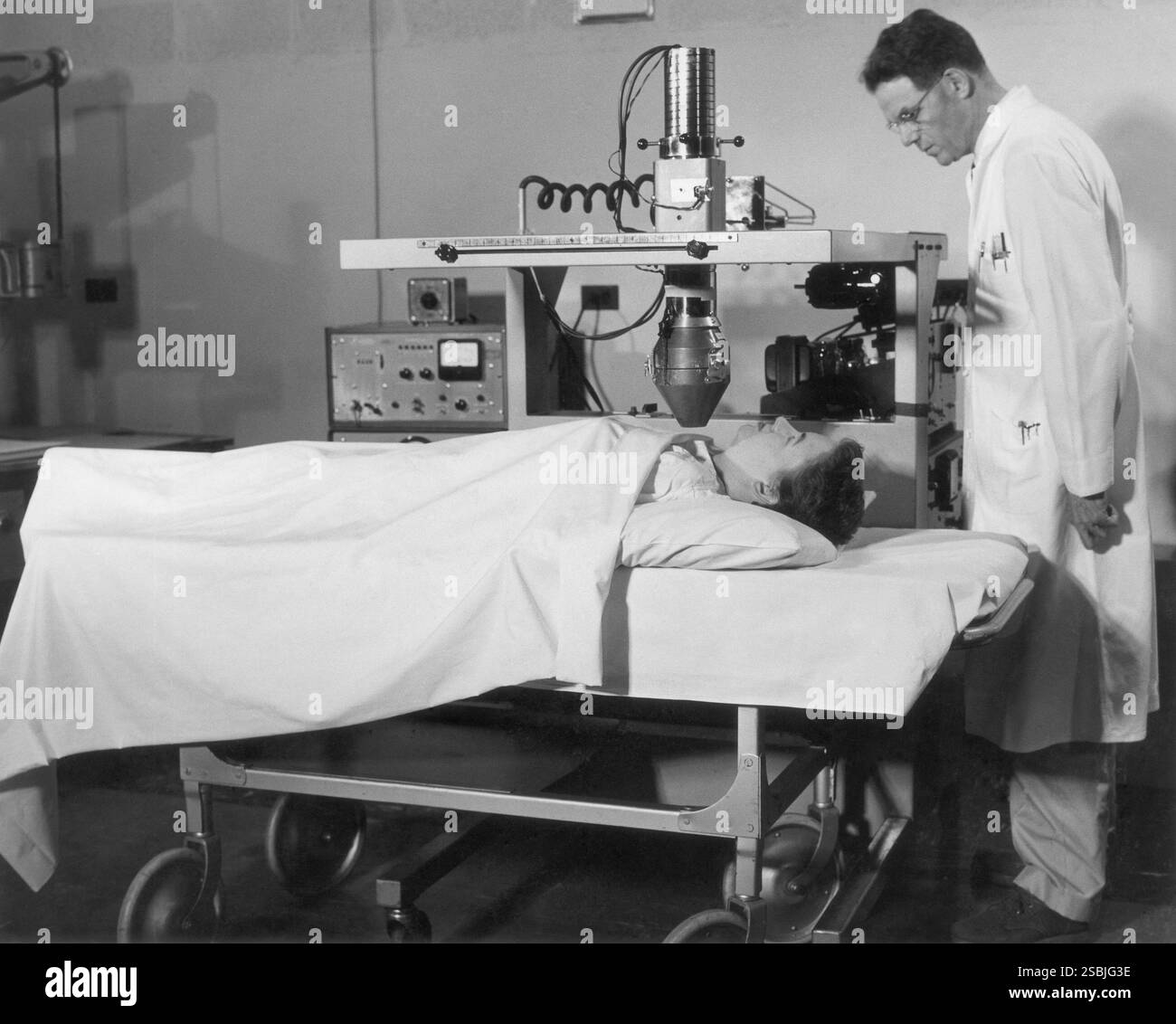 A doctor at the Medical Division of the Oak Ridge Institute of Nuclear ...