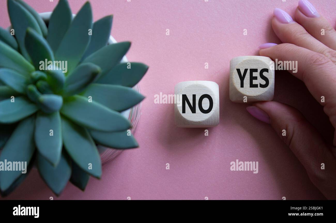 Yes vs No symbol. Businessman hand is making a choice between YES and ...