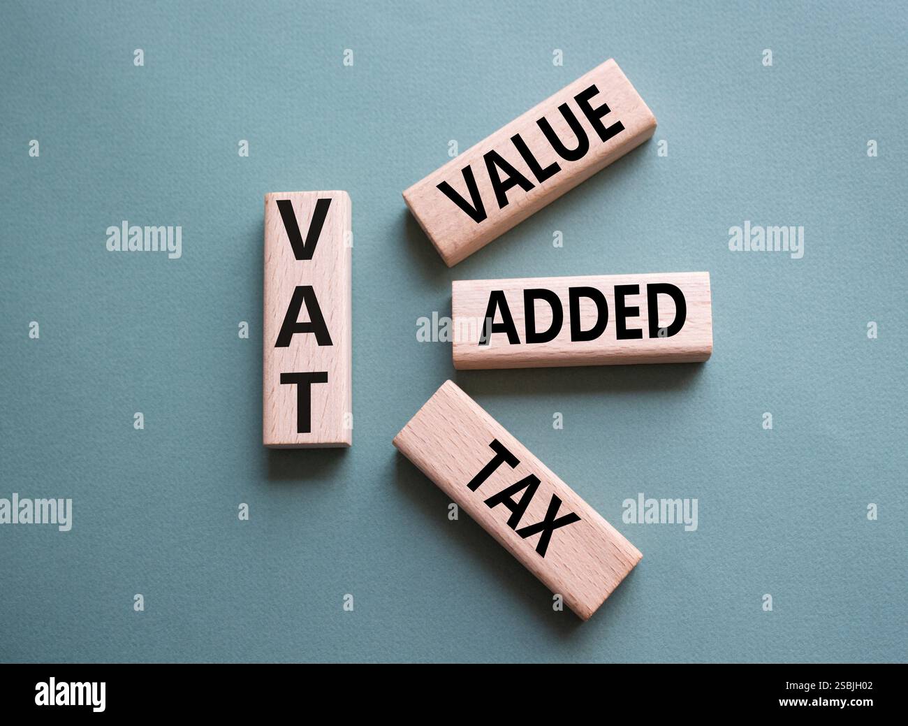 VAT - Value Added Tax symbol. Wooden cubes with word VAT. Beautiful ...