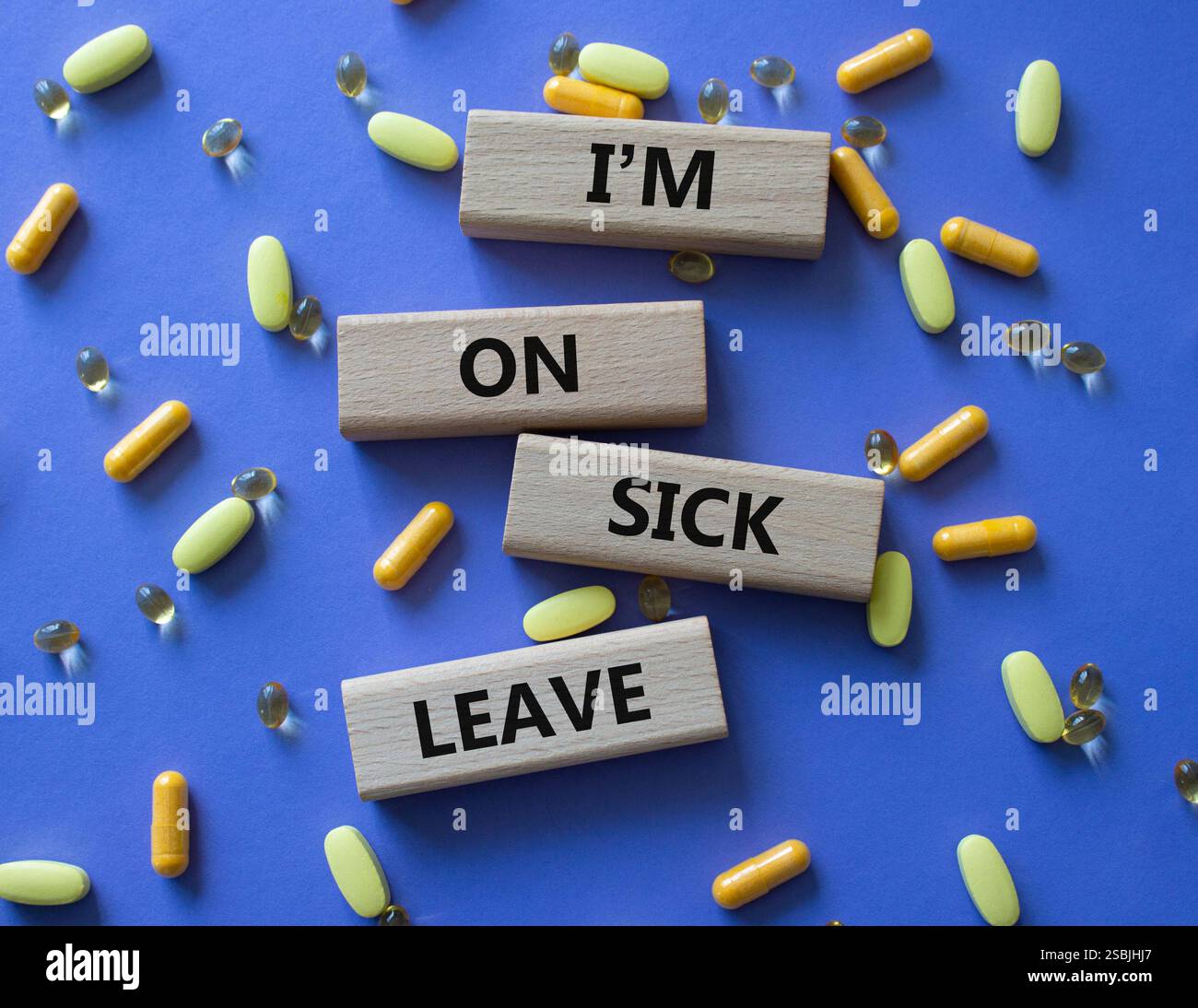 Sick leave symbol. Concept word I am on sick leave on wooden blocks ...