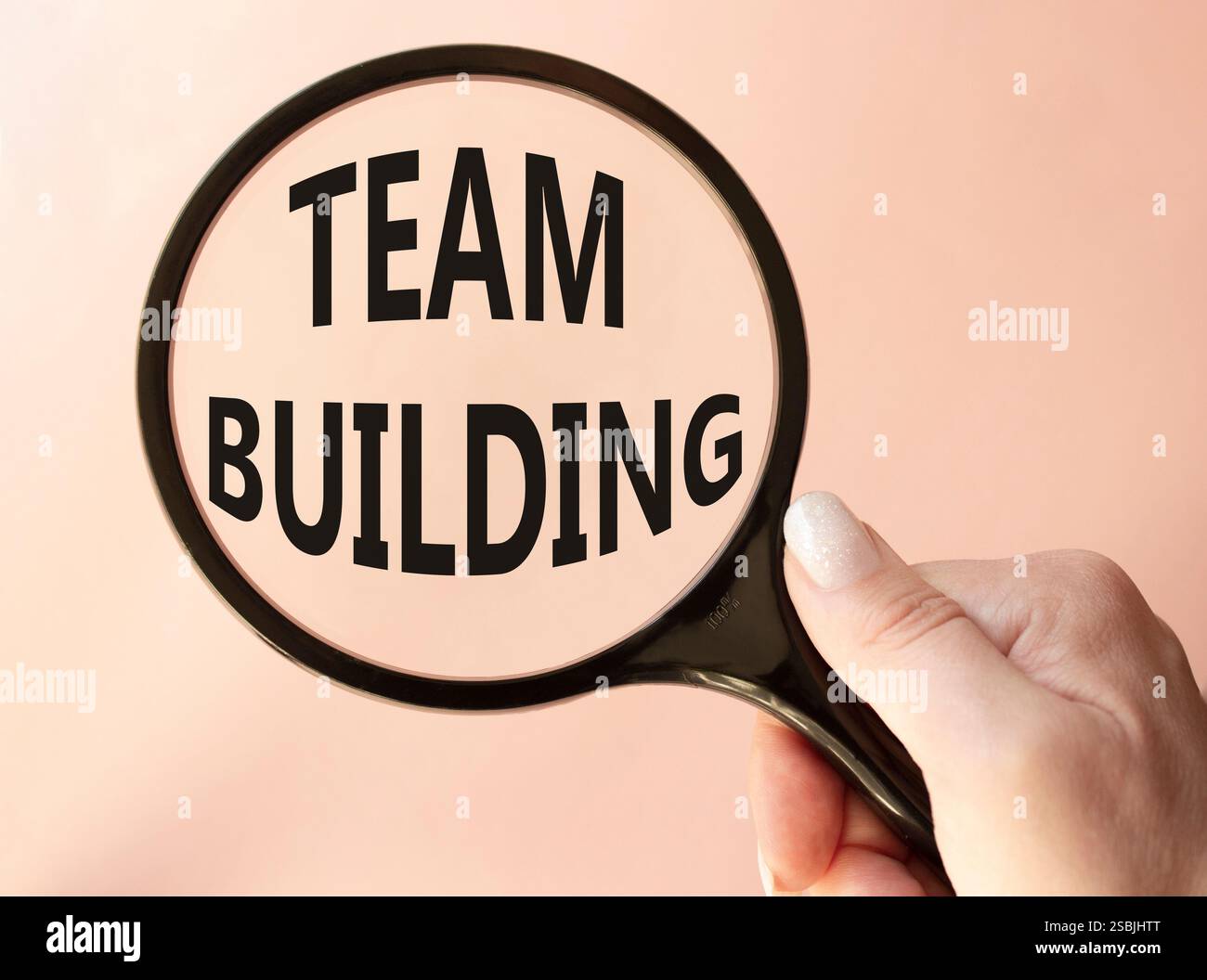 Team Building symbol. Concept word Team Building on magnifying glass ...