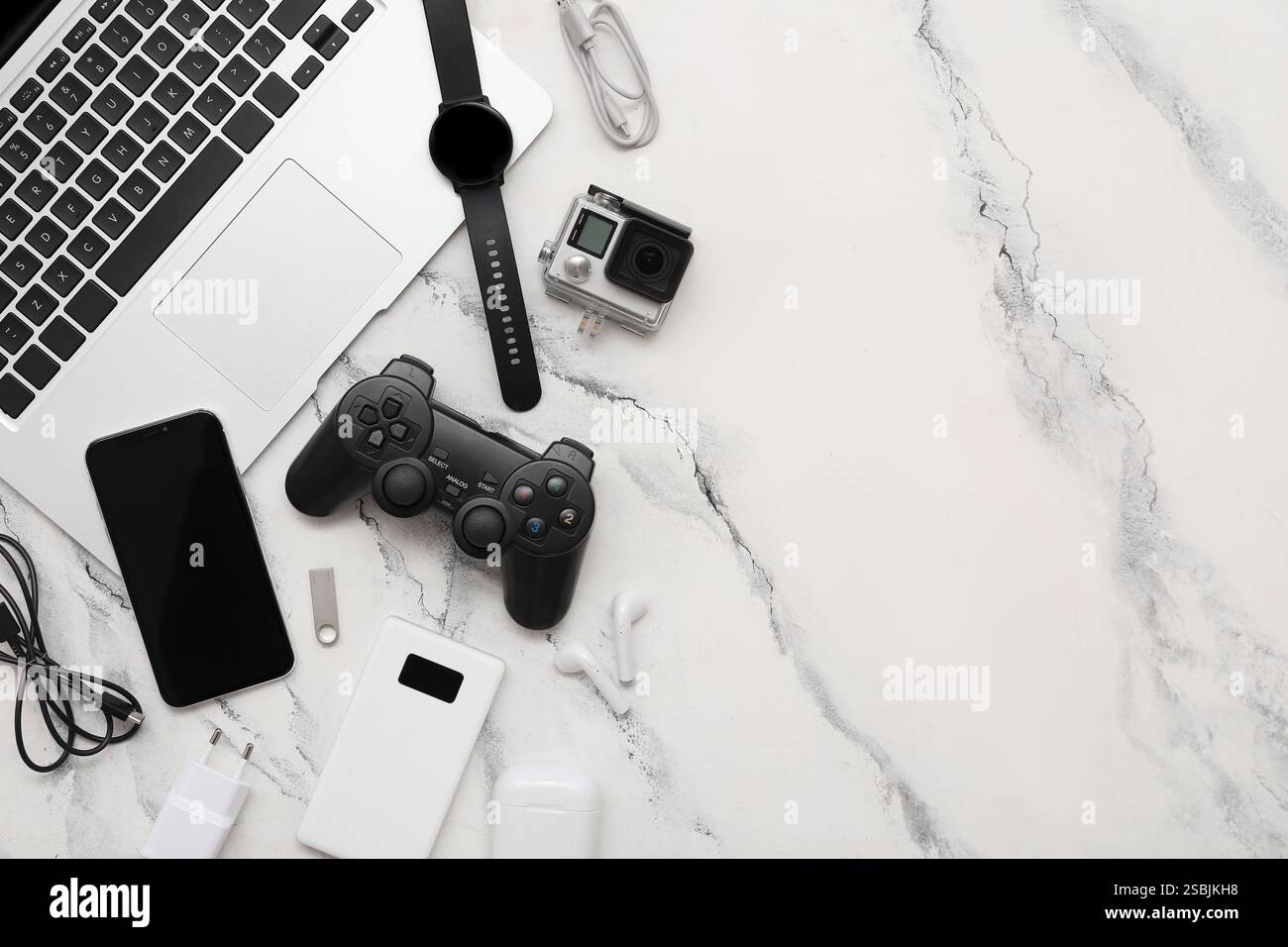 Set of different modern gadgets with laptop on light background Stock ...