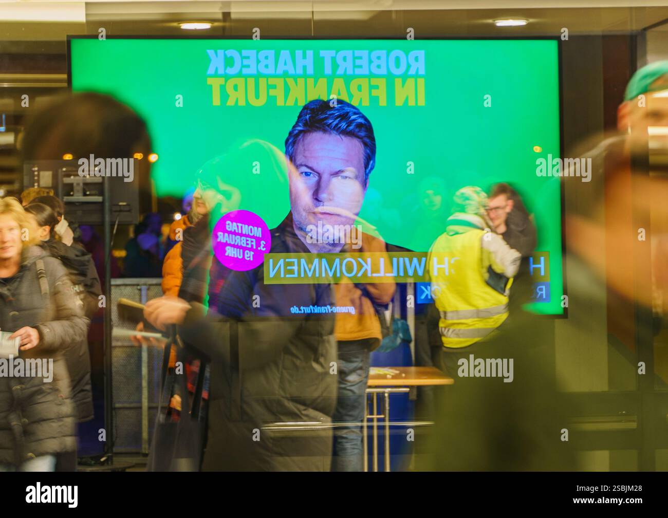 03 February 2025, Hesse, Frankfurt/Main: An election poster with the ...