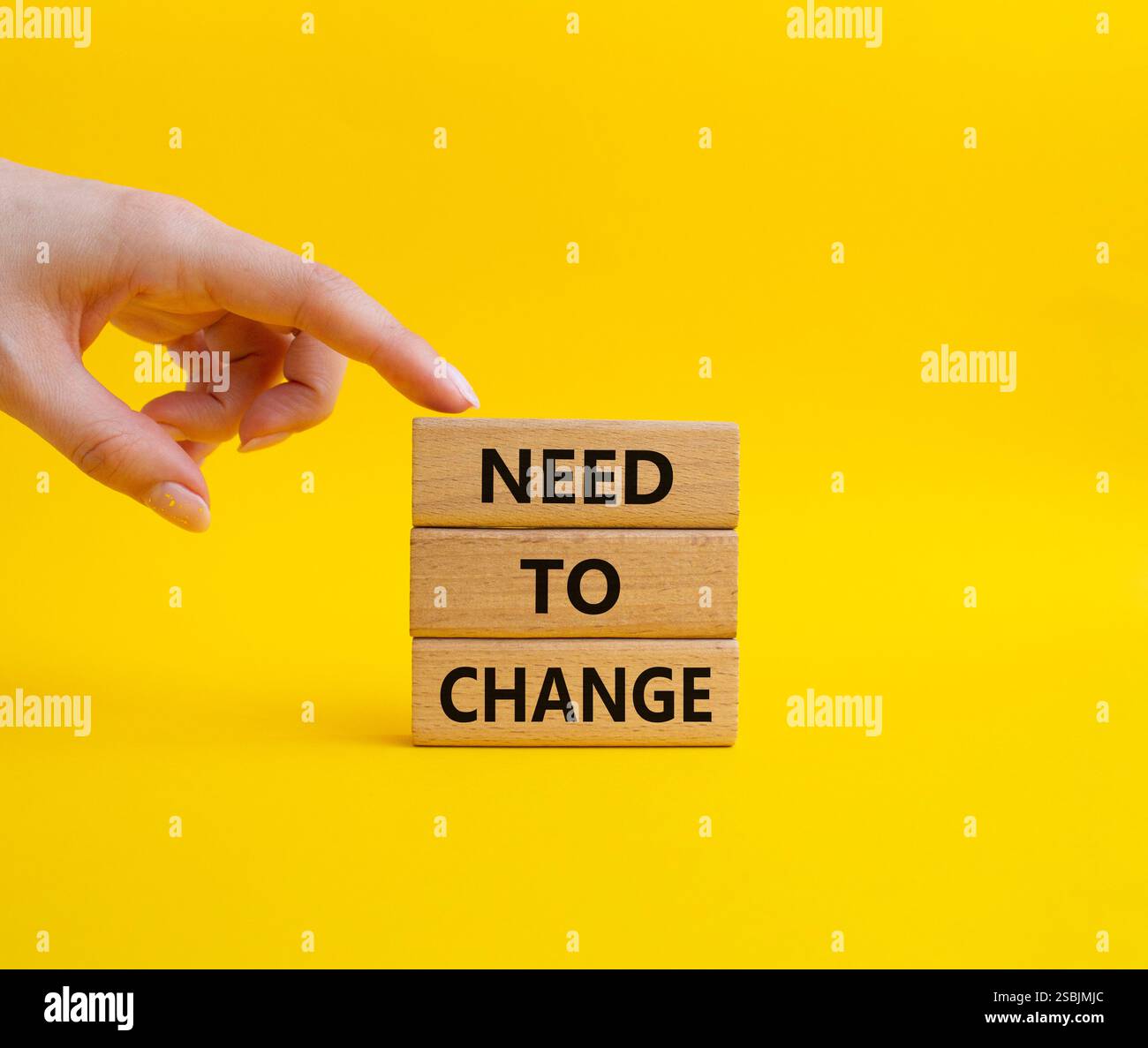 Need to change symbol. Concept words 'Need to change' on wooden blocks ...