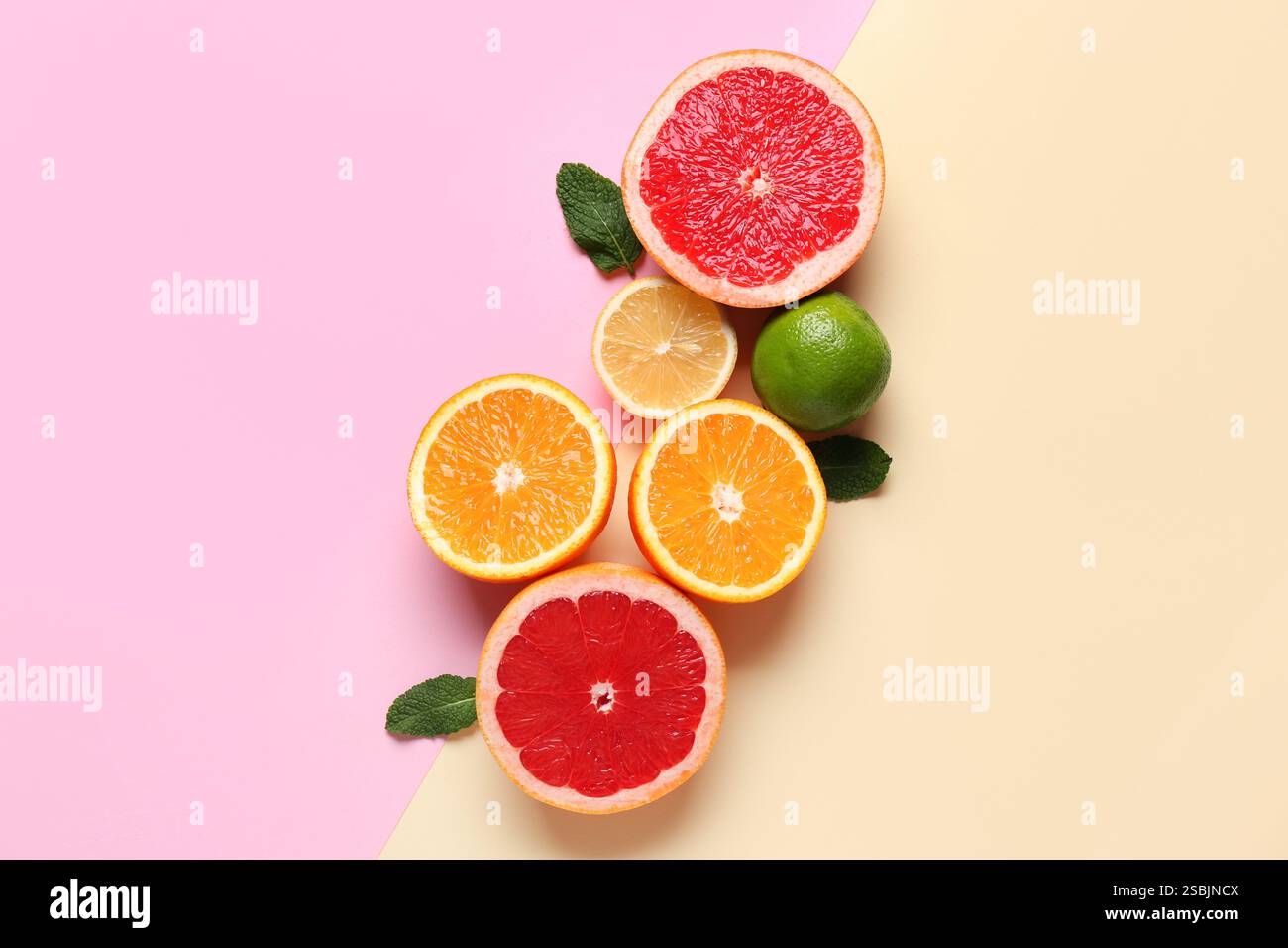 Different cut citrus fruits with mint leaves on color background Stock ...