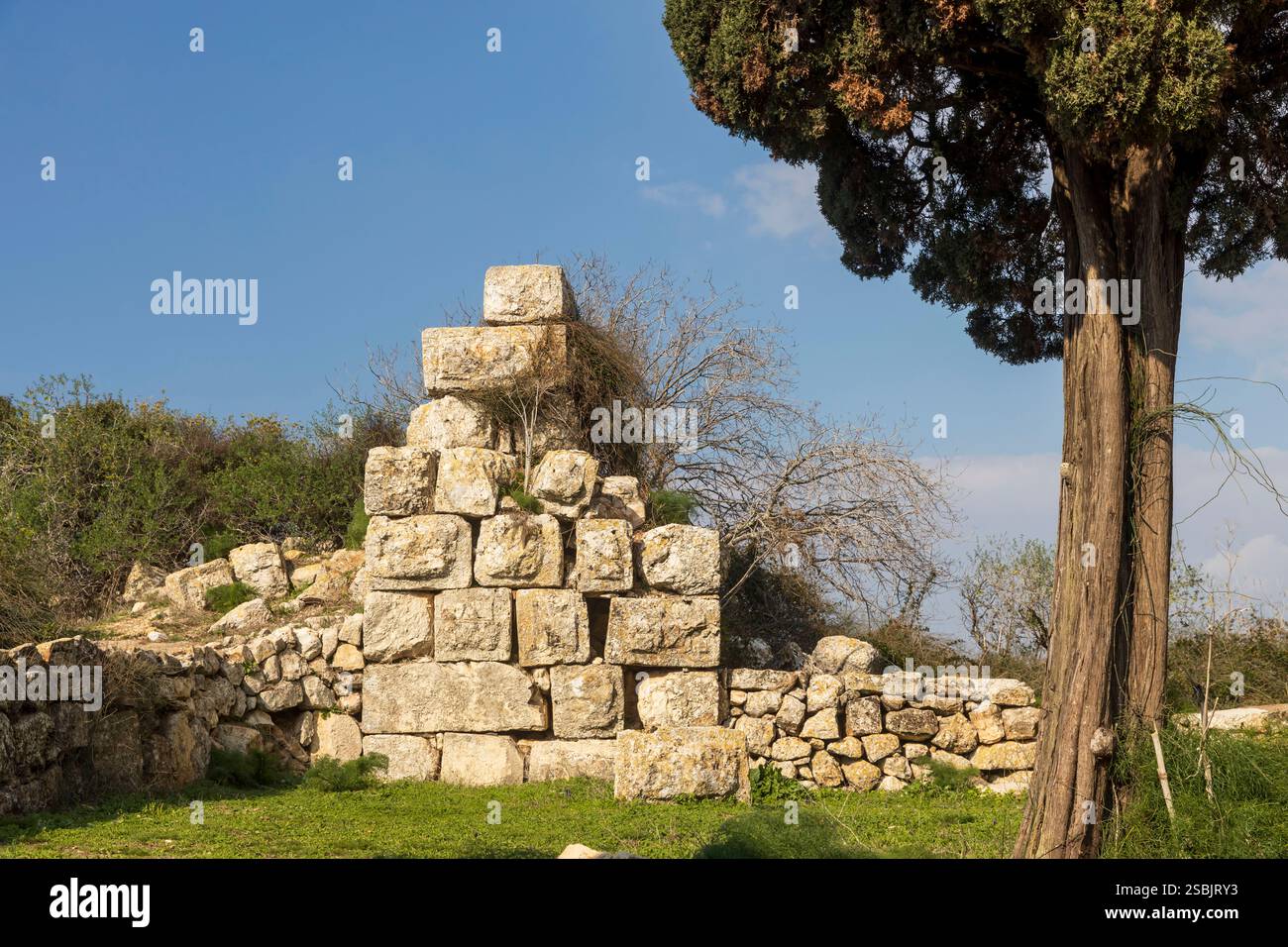 Stone ruins of ancient fortifications on Mount Tabor. Bridge over the ...