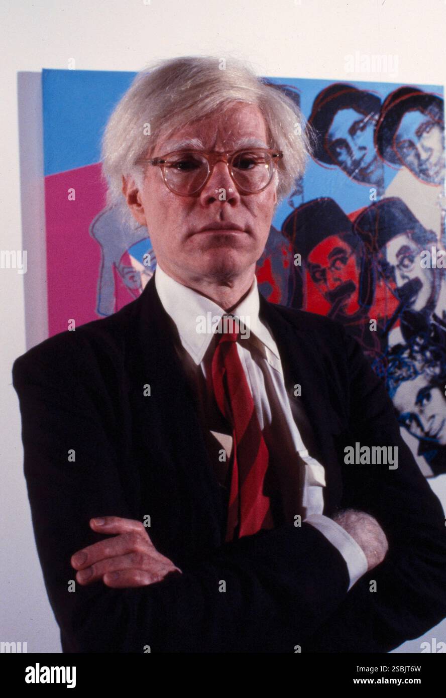 Andy Warhol (1928-1987) with his art at the Jewish Museum in New York ...