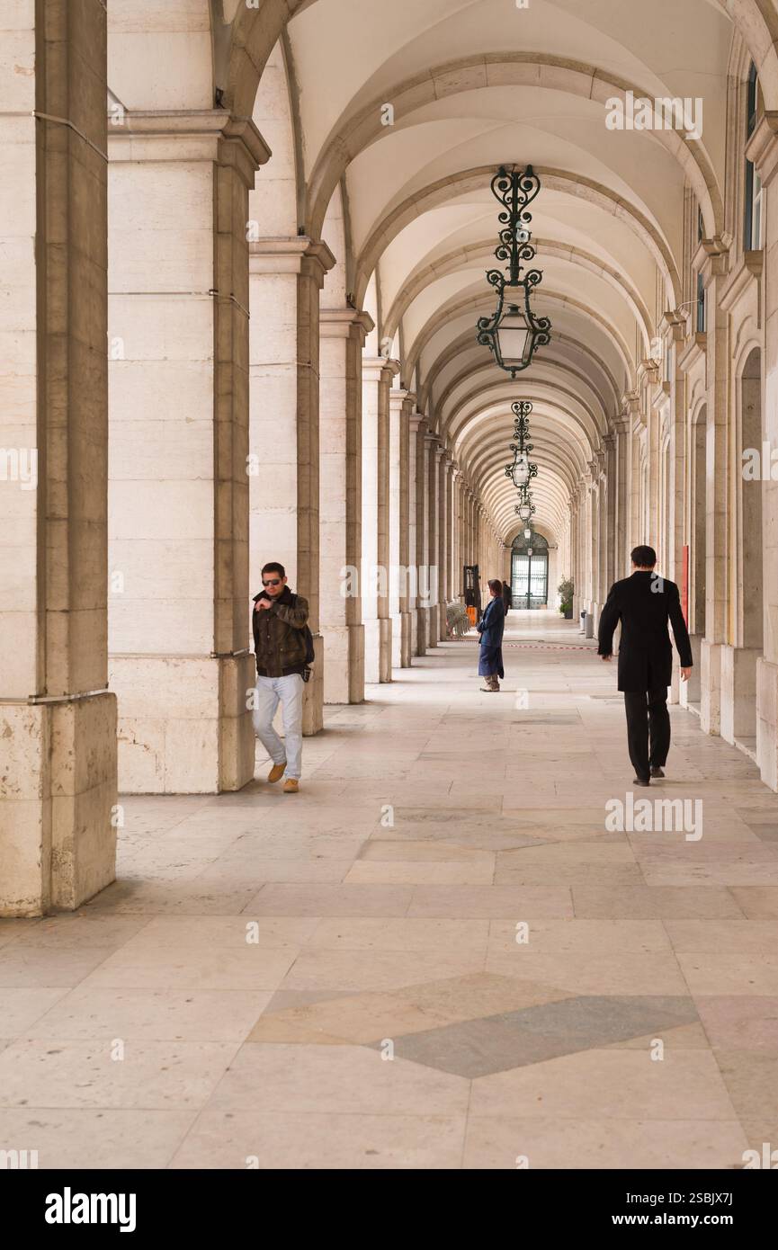 Architectural Arcade in Lisbon with People Stock Photo - Alamy