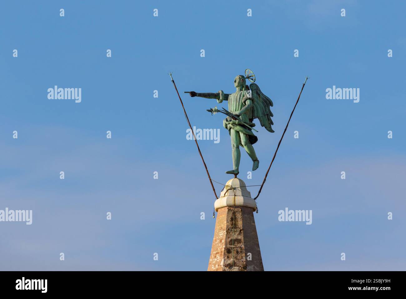 Weathervane statue of Archangel Michael on the top of Basilica of Saint ...