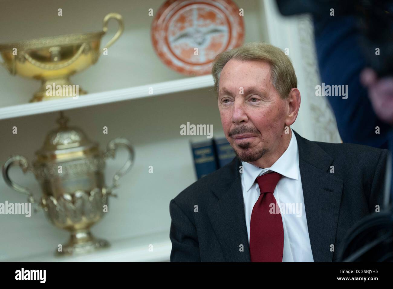 Larry Ellison watches as United States President Donald J Trump signs ...