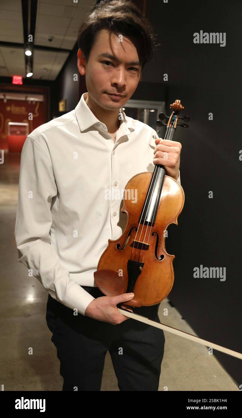 New York, New York, USA. 3rd Feb, 2025. Violinist STEFAN JACKIW holds ...
