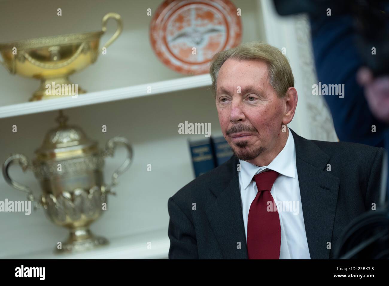 Larry Ellison watches as United States President Donald J Trump signs ...